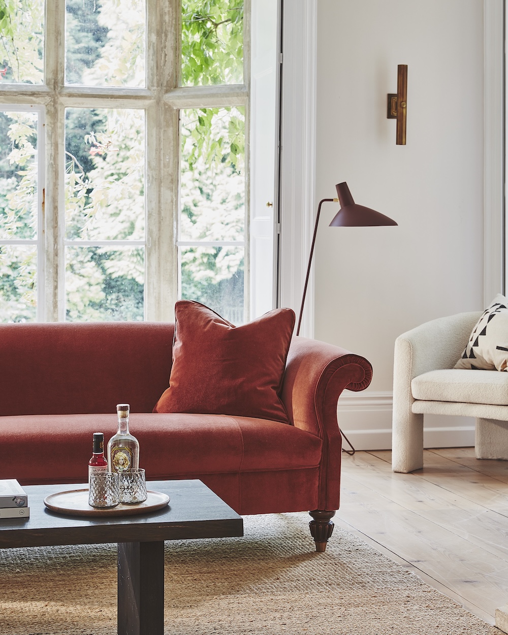 Colour your living room with a red sofa | Darlings of Chelsea